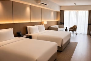 Quarto triplo luxo, várias camas