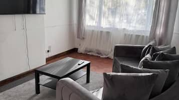 Apartamento, 2 quartos, vista para o jardim | Área de estar
