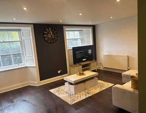 Apartamento, 3 quartos | Sala