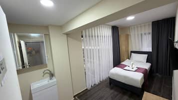 Quarto solteiro | Wi-Fi de cortesia