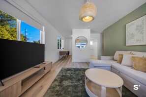 Apartamento Comfort, 1 quarto, pátio | Sala de estar