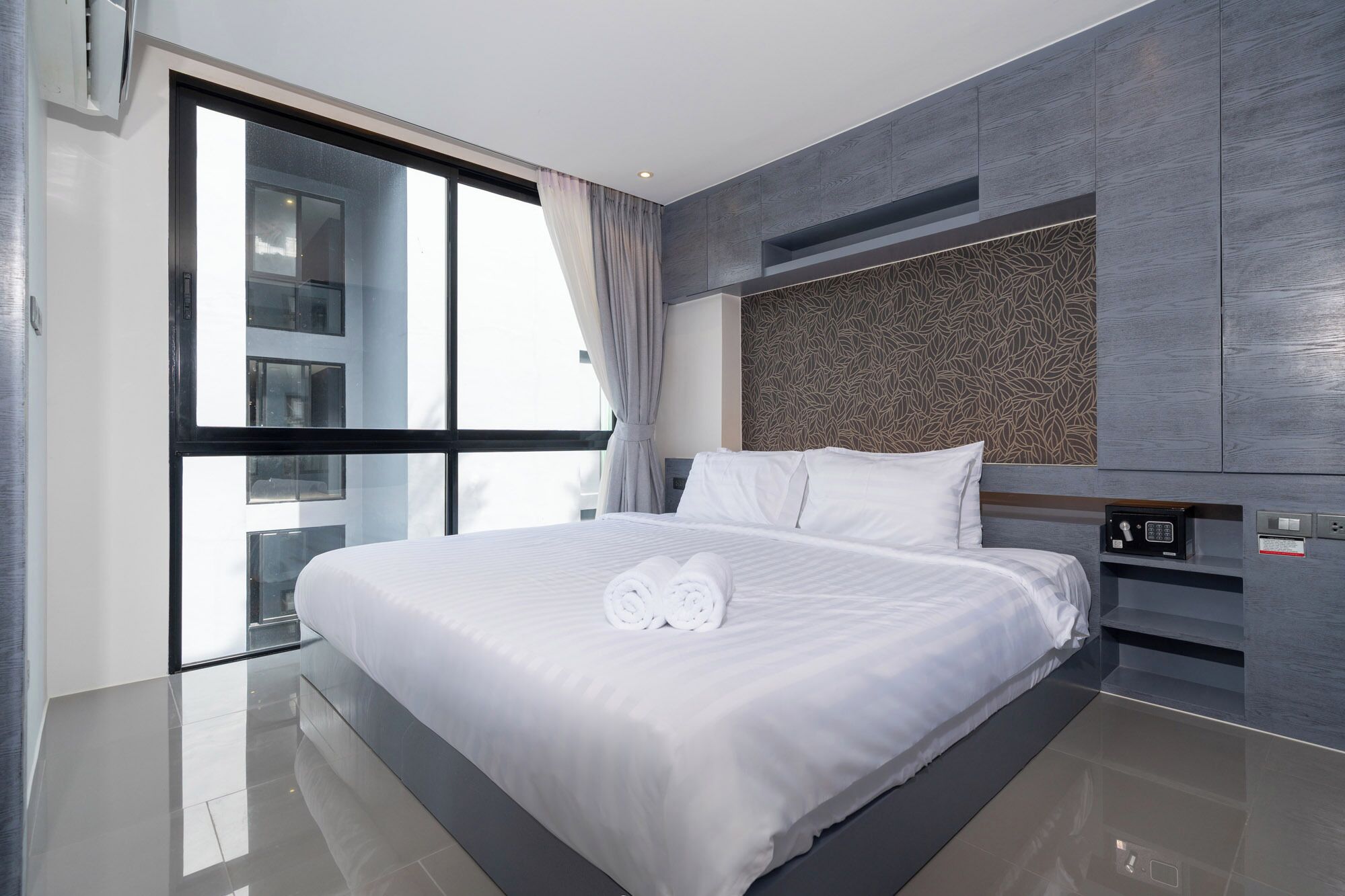 Apartamento, 1 quarto (Fabulous CityGate Kamala 1BR Suite) | Cofre no quarto, ferro/tábua de engomar, Wi-fi grátis 