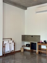 Quarto Duplo Superior, vista parcial para o mar | Sala de estar