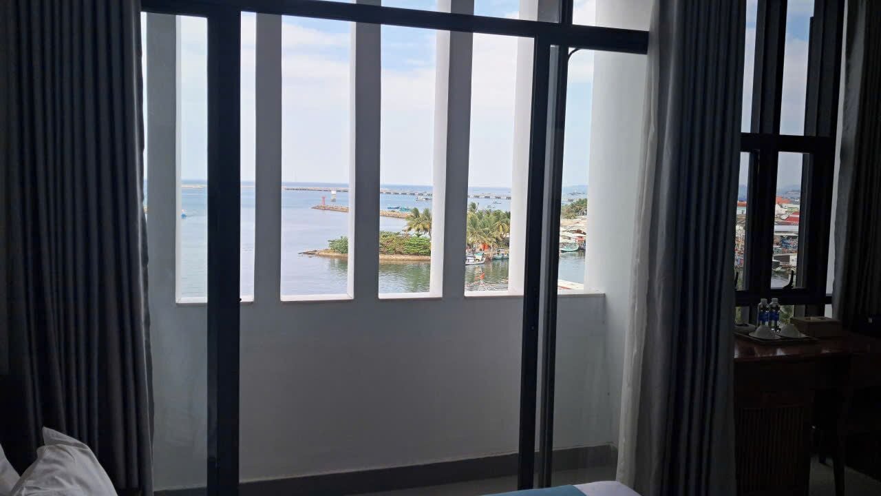 Quarto Duplo Deluxe, vista para a praia | Secretária, Wi-fi grátis 