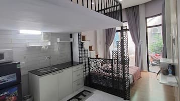 Quarto Familiar | Cozinha privada | Um frigorífico, um micro-ondas