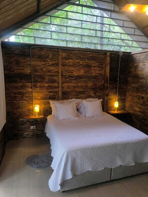 Quarto casal luxo, vista para o jardim