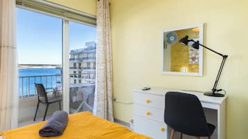 Apartamento, vista para o mar | Cortinas/cortinados opacos, ferro/tábua de engomar, Wi-fi grátis