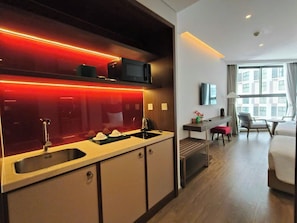 Quarto quádruplo família, vista para o mar | Cozinha privada | Chaleira elétrica