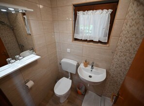Apartamento | Casa de banho | Um secador de cabelo 