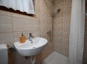 Apartamento | Casa de banho | Um secador de cabelo 