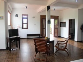 Quarto casal luxo, vista para o jardim | Parte interna