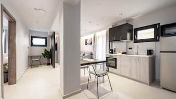 Apartamento superior | Área de estar | Smart TV