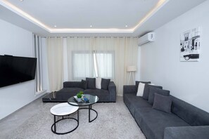 Apartamento, 2 quartos, fumadores, varanda | Sala