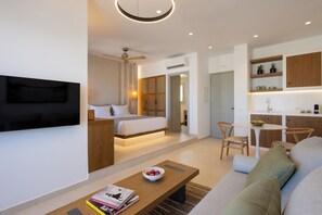 Suíte luxo | Área de estar | Smart TV 43 polegadas com canais a cabo