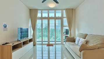 Apartamento Comfort, 3 quartos, varanda, Vista para a cidade | Sala de estar