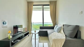 Apartamento Club, 1 quarto, varanda, Vista para a cidade | Sala de estar