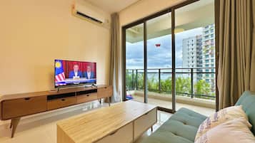 Apartamento Executivo, 3 quartos, varanda, Vista para a cidade | Sala de estar