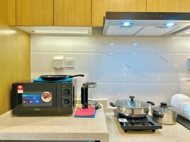 Suíte estúdio urbana, 1 cama King, vista para a cidade | Cozinha privada