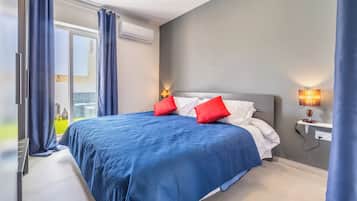 Cobertura, cozinha, vista para a cidade | Cortinas blackout, ferros/tábuas de passar roupa, Wi-Fi de cortesia