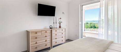 Vila família, vários quartos (Villa Ora) | 3 quartos, ferros/tábuas de passar roupa, Wi-Fi de cortesia