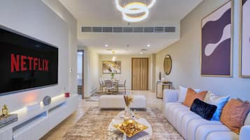 Apartamento superluxo, vista para a cidade | Área de estar