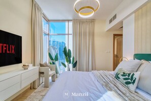 Apartamento superluxo, vista para a cidade | Cortinas blackout, ferros/tábuas de passar roupa, Wi-Fi de cortesia