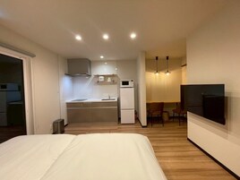 Apartamento conforto, vista para o jardim | Escrivaninha, Wi-Fi de cortesia