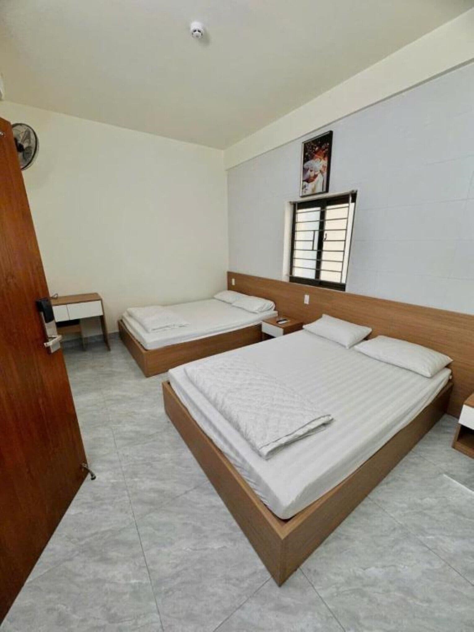 Quarto quádruplo | Frigobar, cortinas blackout, Wi-Fi de cortesia, roupa de cama