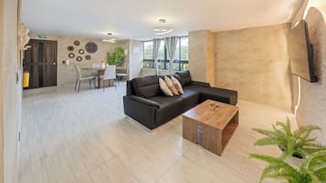 Apartamento | Área de estar | TV de tela plana