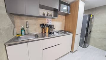 Apartamento | Cozinha privada | Cafeteira/chaleira