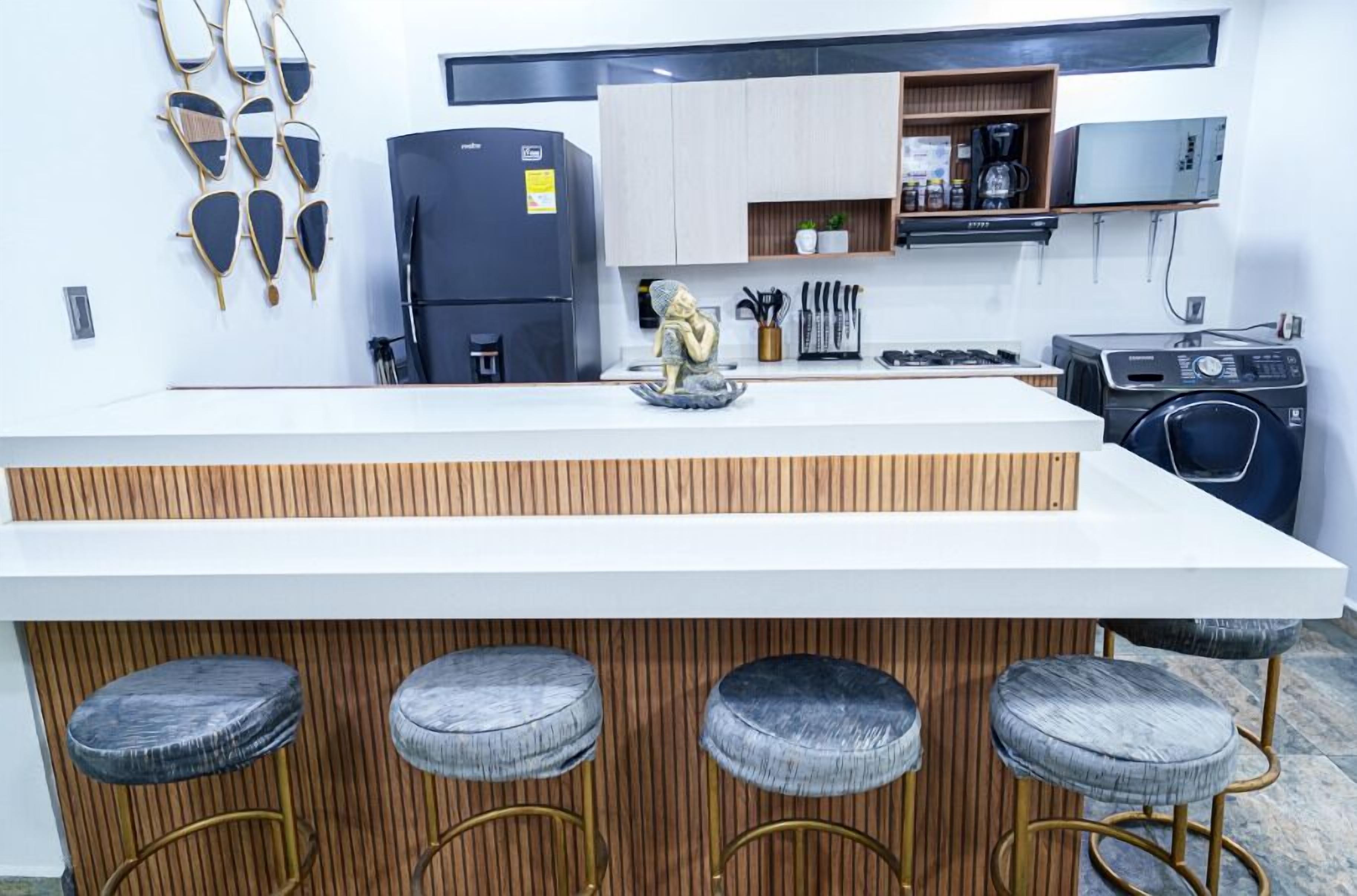 Apartamento Cidade | Cozinha privada | Uma cafeteira/bule 