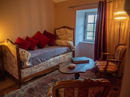 Suíte superluxo, vista para o jardim | Área de estar