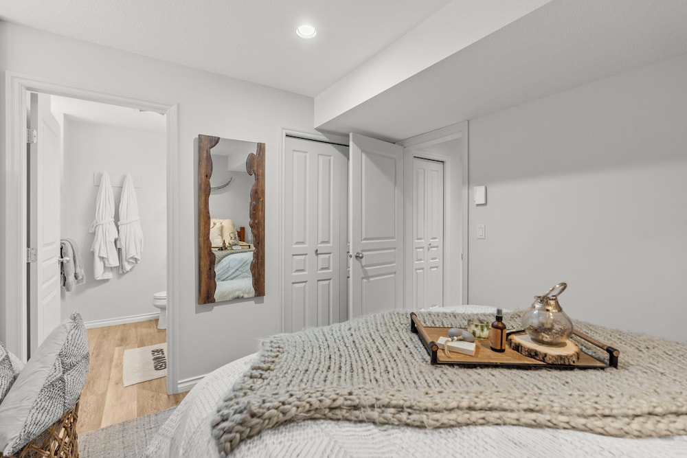 Modern 2 bedroom ground level suite w/ private hot tub, laundry, ski-in ...