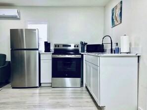 Casa, várias camas, pátio, vista para o jardim (Boardwalk Bungalow) | Cozinha privada