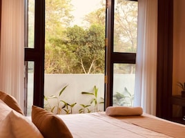 Villa Deluxe, varanda, vista para a piscina | Berços/camas para crianças grátis, Wi-fi grátis 