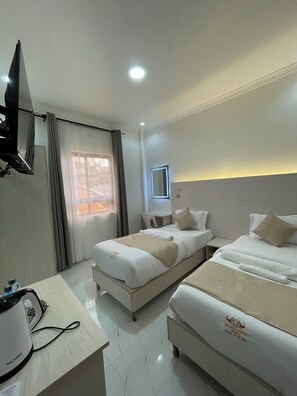 Quarto duplo luxo | Wi-Fi de cortesia, roupa de cama