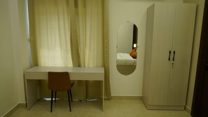 Quarto Individual Deluxe, Vista para a cidade | Interior