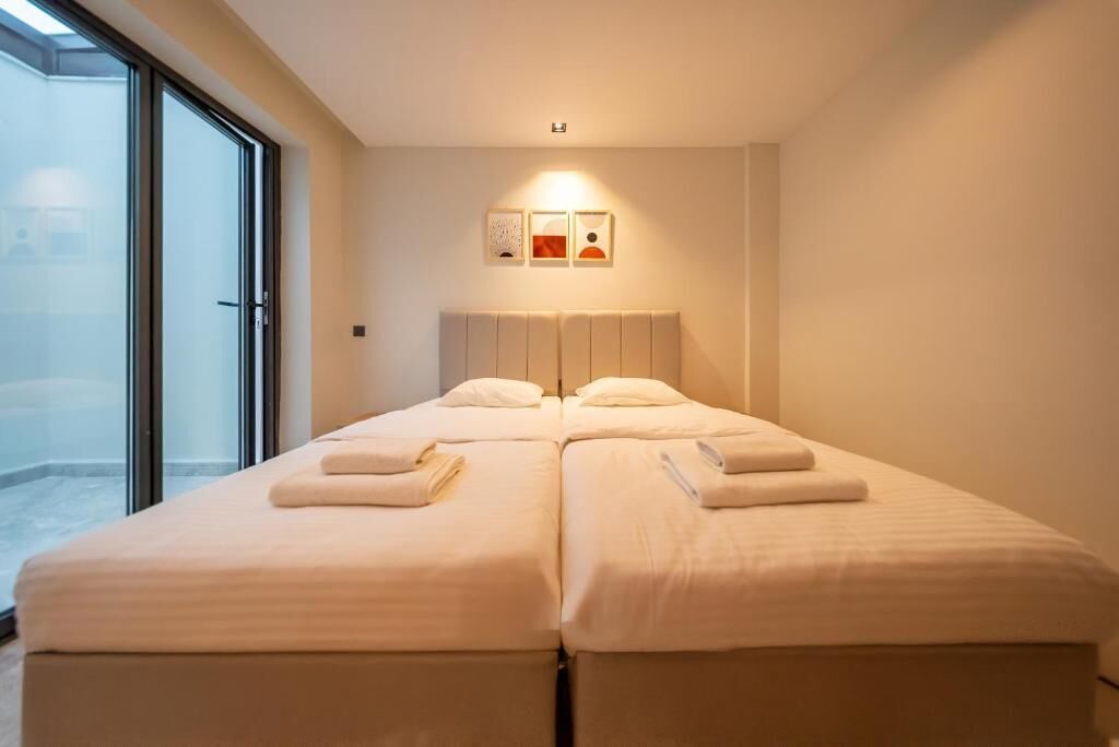 Villa Deluxe, vista parcial para o mar | Ferro/tábua de engomar, Wi-fi grátis 