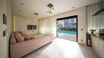 Vila luxo, vista parcial para o mar | Área de estar