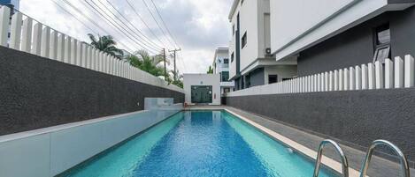 Quarto Júnior, varanda, Vista para a cidade | Piscina