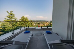 Suite Deluxe, varanda, vista para o jardim | Terrenos do alojamento