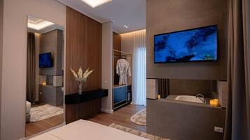 Suite Deluxe, varanda, vista para o jardim | Secretária, quartos insonorizados, ferro/tábua de engomar, Wi-fi grátis