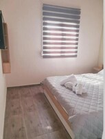 Cofres nos quartos, ferros/tábuas de passar roupa, Wi-Fi de cortesia