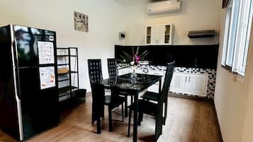 Quarto Duplo Deluxe, 2 quartos | Sala de estar