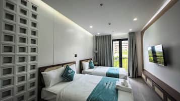 Quarto Deluxe, Vista para a cidade | Wi-fi grátis, roupa de cama fornecida