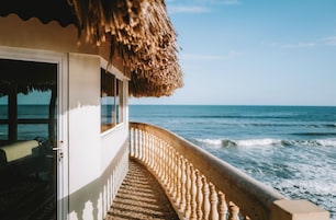 Quarto, vista para a praia | Terrenos do alojamento