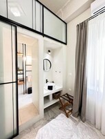 Suíte luxo, vista para a cidade | Banheiro