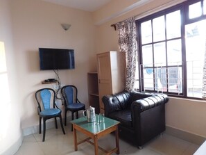 Estúdio família, vista para a montanha | Área de estar