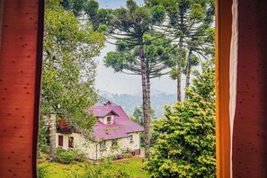Quarto luxo, sacada, vista para o jardim | Vista do quarto