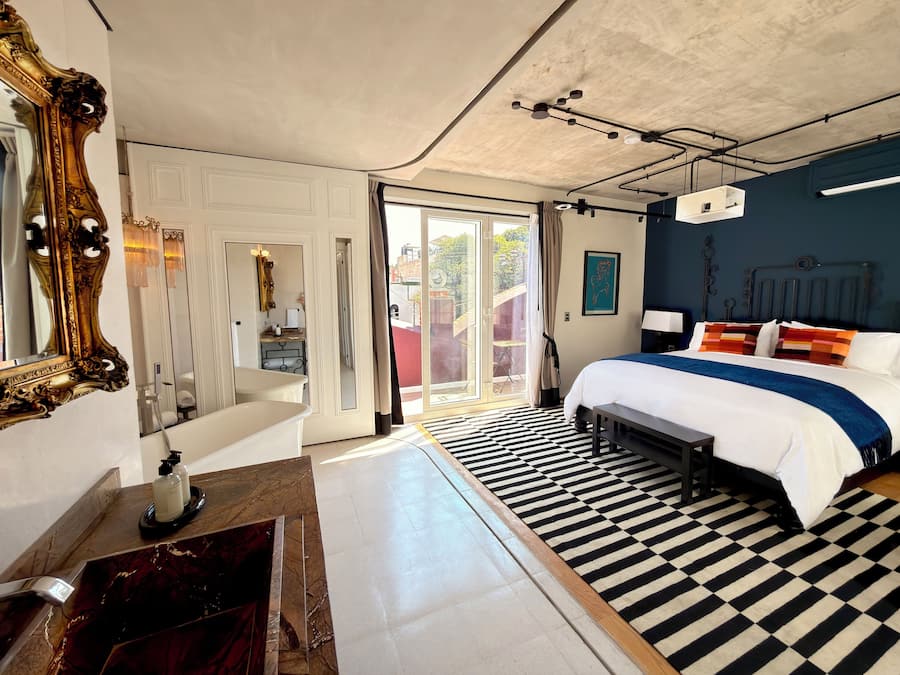 Suite-Estúdio Design, 1 cama king-size, Vista para a cidade | Roupa de alta qualidade, edredões de penas, minibar, cofre no quarto